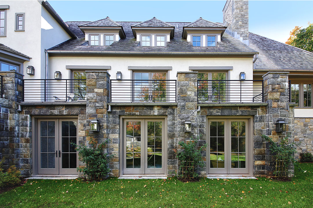Tour a Modern Tudor-Style Home Designed with Stone in Mind - Cottages ...